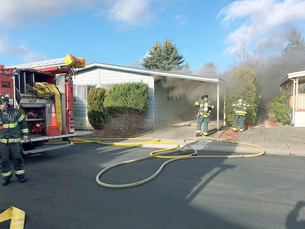 Firefighters battle Kent mobile home fire | Update | Kent Reporter