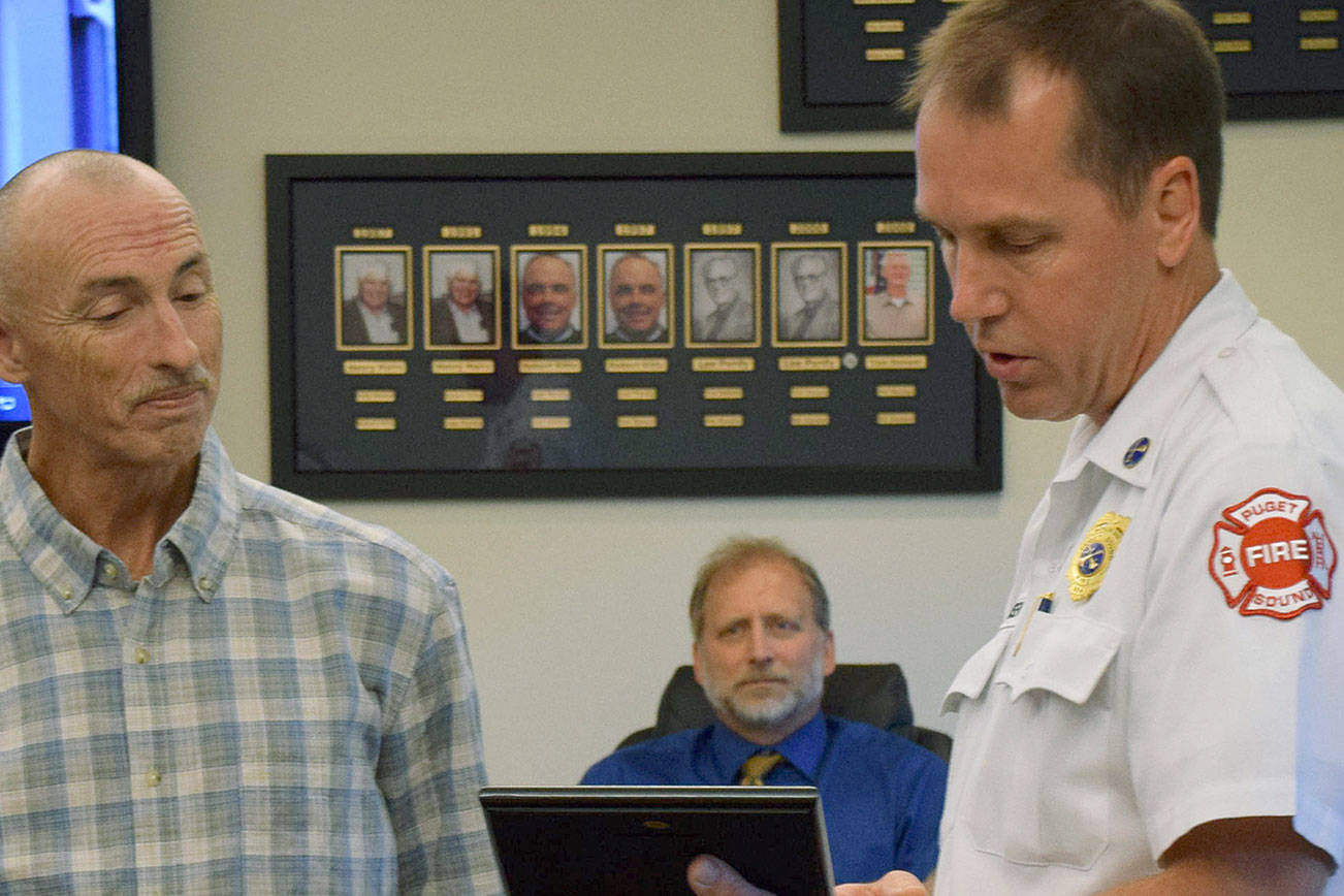 Kent man receives award for rescuing woman from duplex fire | Kent Reporter