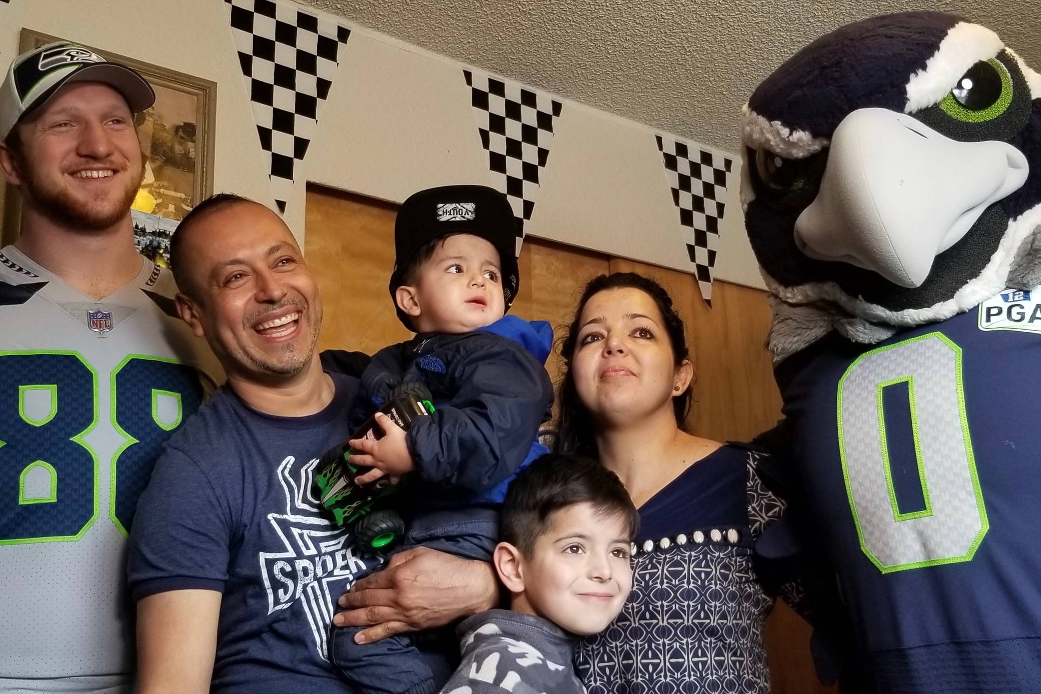 Monster Jam, Seahawks team up to surprise Mercy Housing family in Kent ...