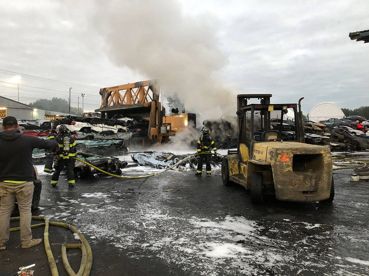 Crews extinguish fire at Kent wrecking yard | Kent Reporter