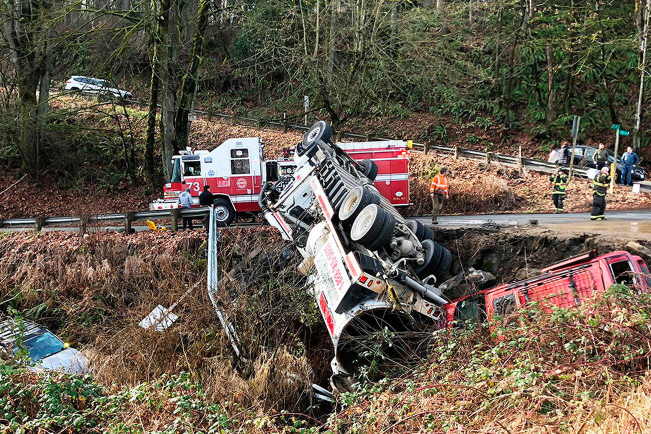 Three vehicles go over an embankment near Kent, Auburn | Kent Reporter