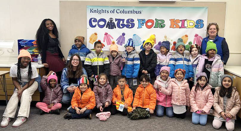 Springbrook Elementary students in Kent receive new coats, hats | Kent Reporter